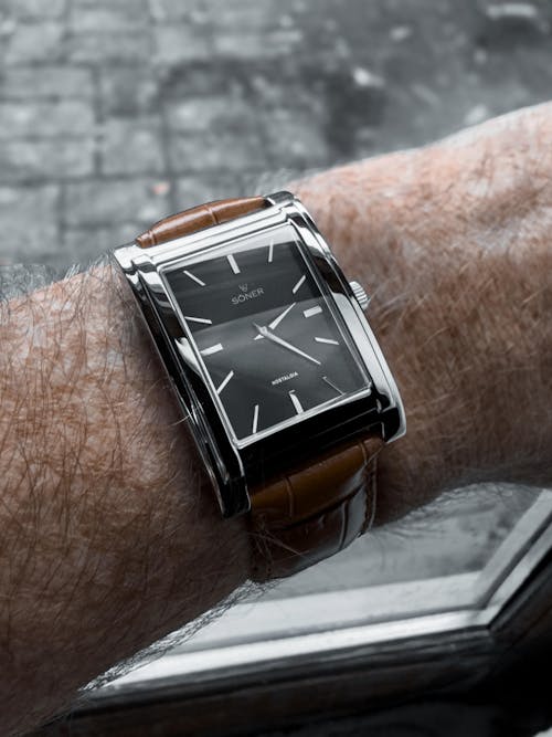 Tokyo, a rectangular watch in polished steel with green dial