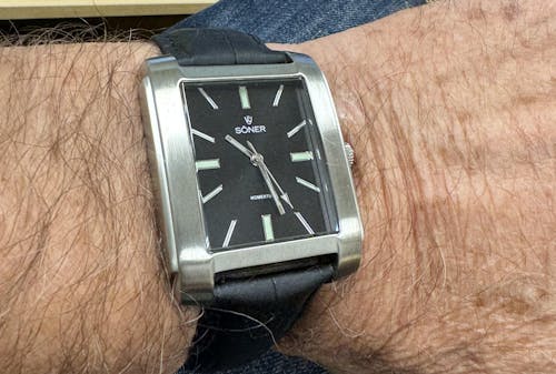 Tokyo, a rectangular watch in polished steel with green dial
