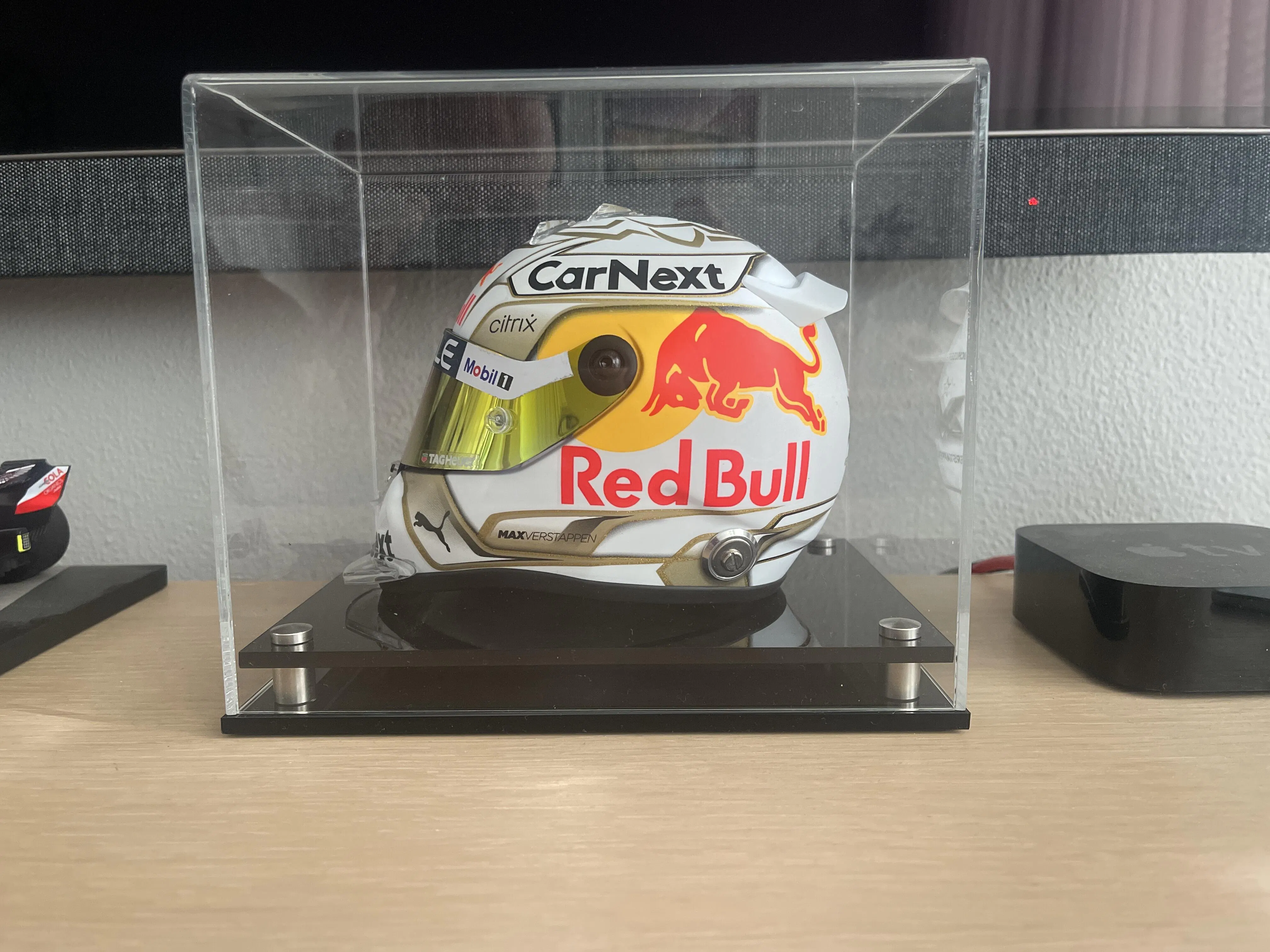 Half Scale F1 Helmet Display Case with a Modern Base