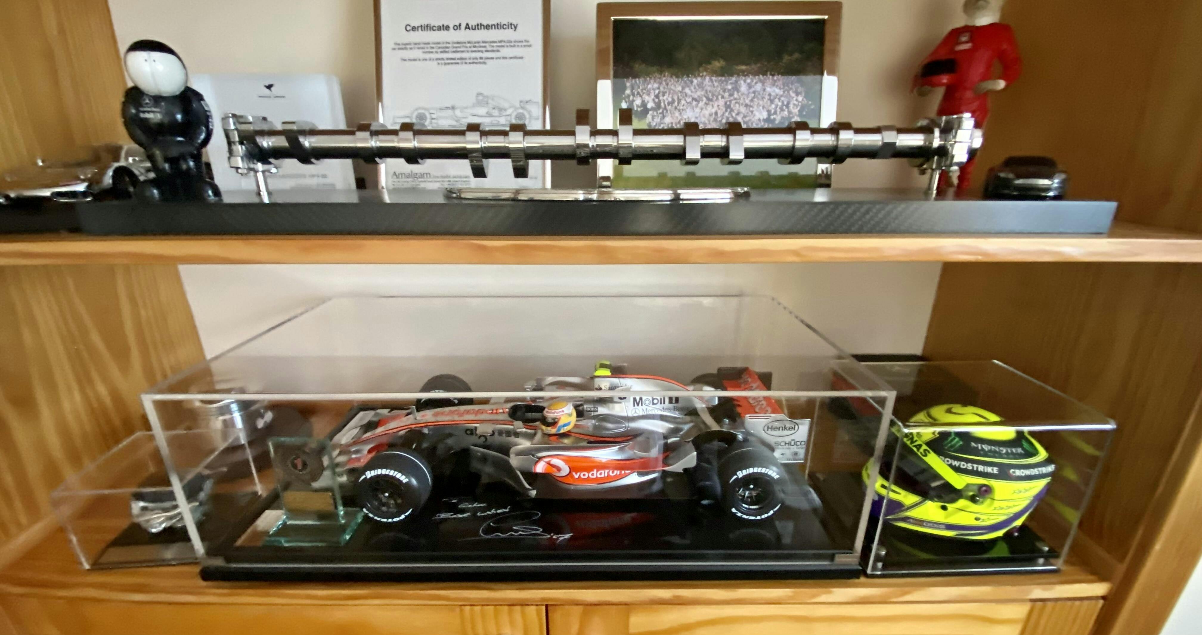 Half Scale F1 Helmet Display Case with a Modern Base