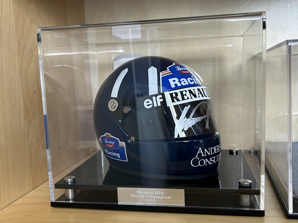 Half Scale F1 Helmet Display Case with a Modern Base