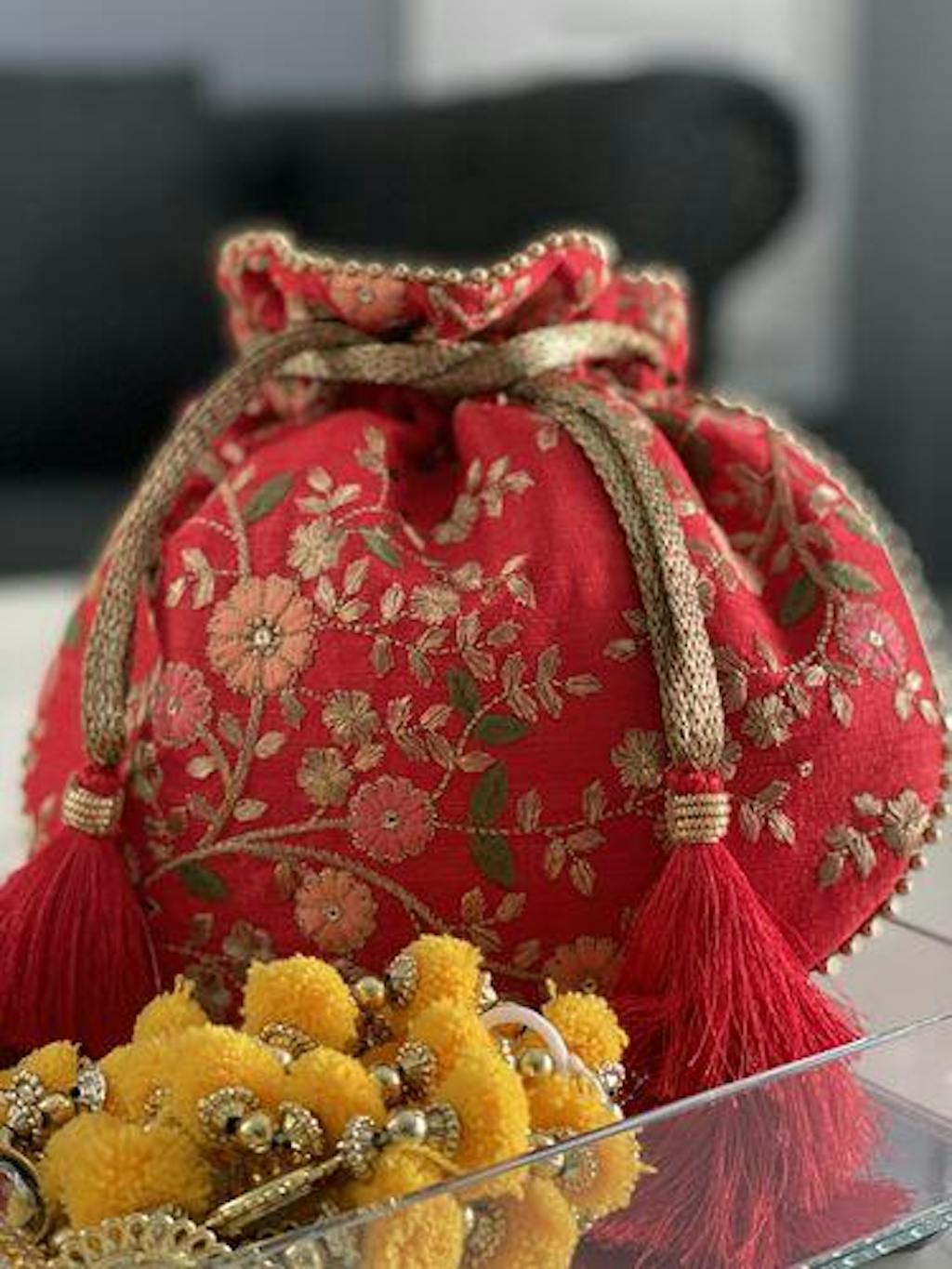Buy AMYRA Floral Creeper Red Potli Bag online - The AMYRA Store