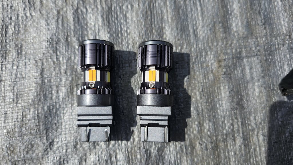 3157 Switchback Dual-Color Turn Signal LED Bulbs — AUXITO