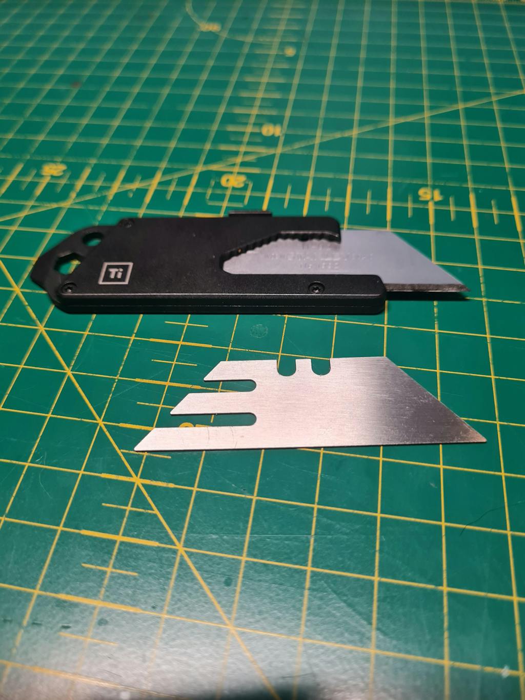 TPT Slide : Titanium Pocket Tool - Big Idea Design LLC