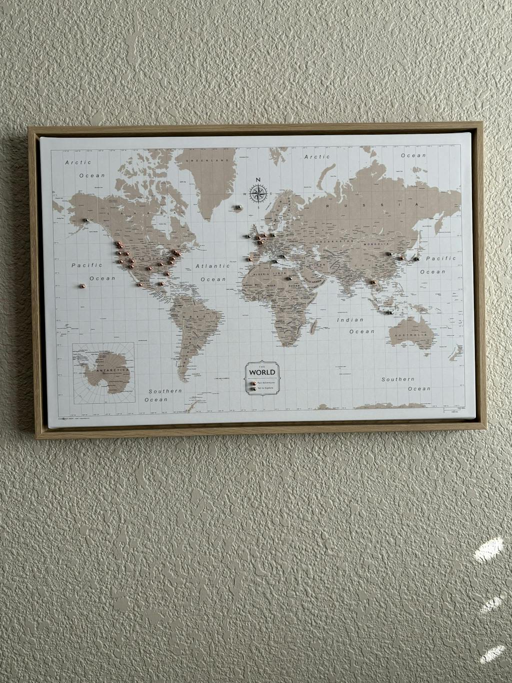 World Travel Map Pin Board with Push Pins: Light Brown Color Splash