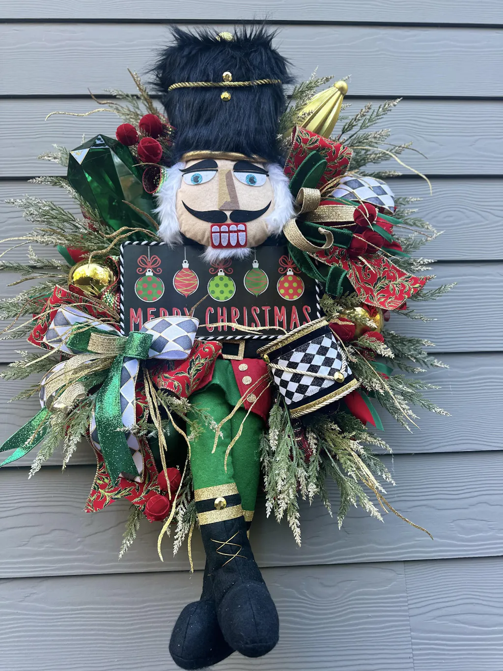 33" 2-Piece Nutcracker Wreath Accent: Black, Emerald & Red