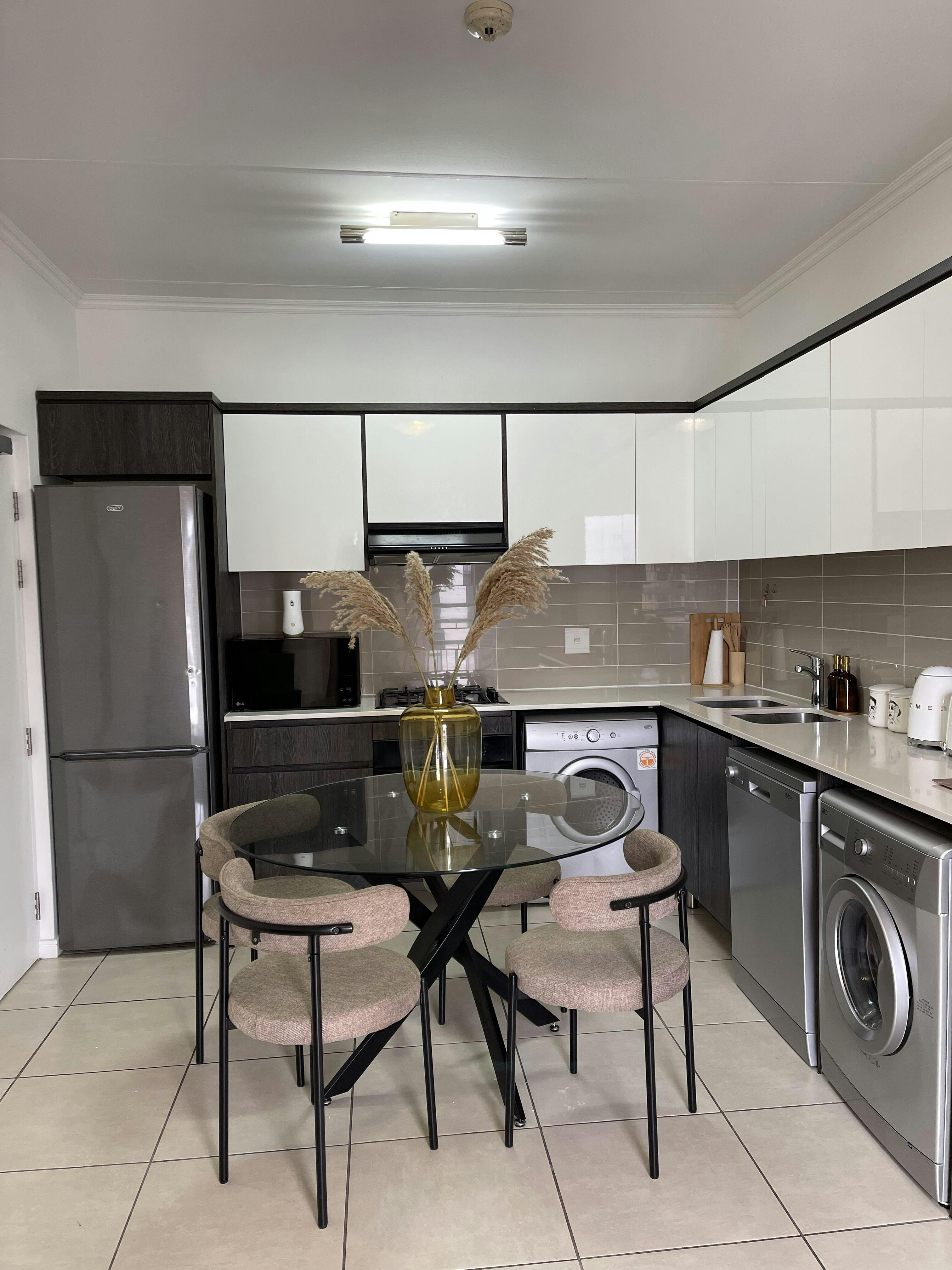 Decofurn | Len Round 10mm Glass Top Dining Table | R1999 – Decofurn ...