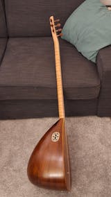 Learning to Play the Long Saz: From Tuning to Strumming