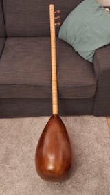 Learning to Play the Long Saz: From Tuning to Strumming