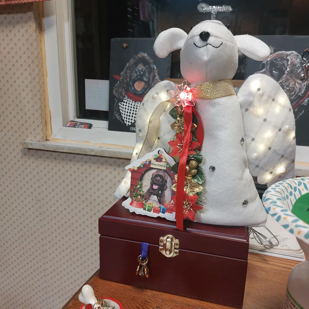 A ‘Christmas Miracle’ Angel Dog Tree Topper- Lighted Poinsettia Garland ...