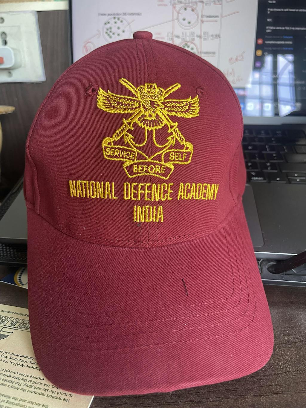 Buy NDA Jointmanship Cap | Maroon Online Indic Inspirations – indic ...
