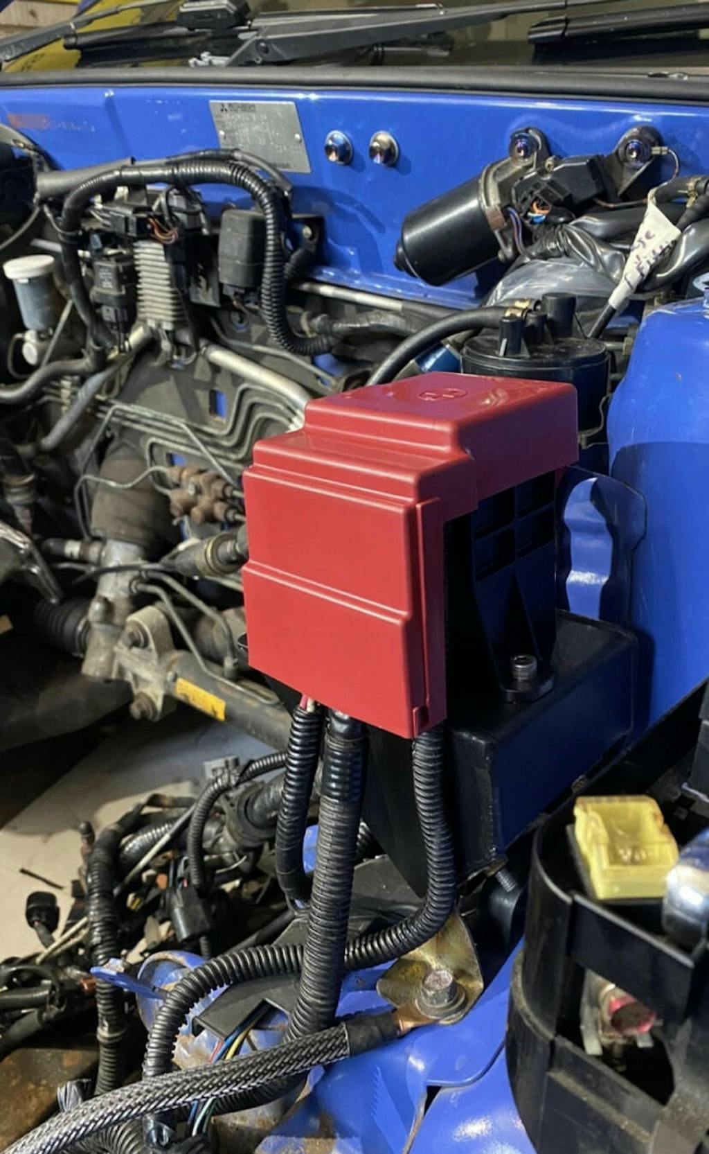 OEM Titanium Battery Relocation Kit (Evo 7-9/Universal) – JD Customs U.S.A