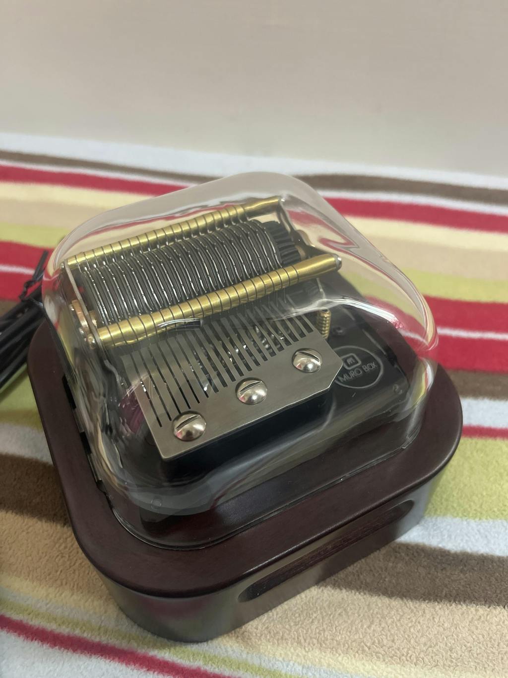 Play Unlimited Melodies on a Mechanical Music Box - Shop