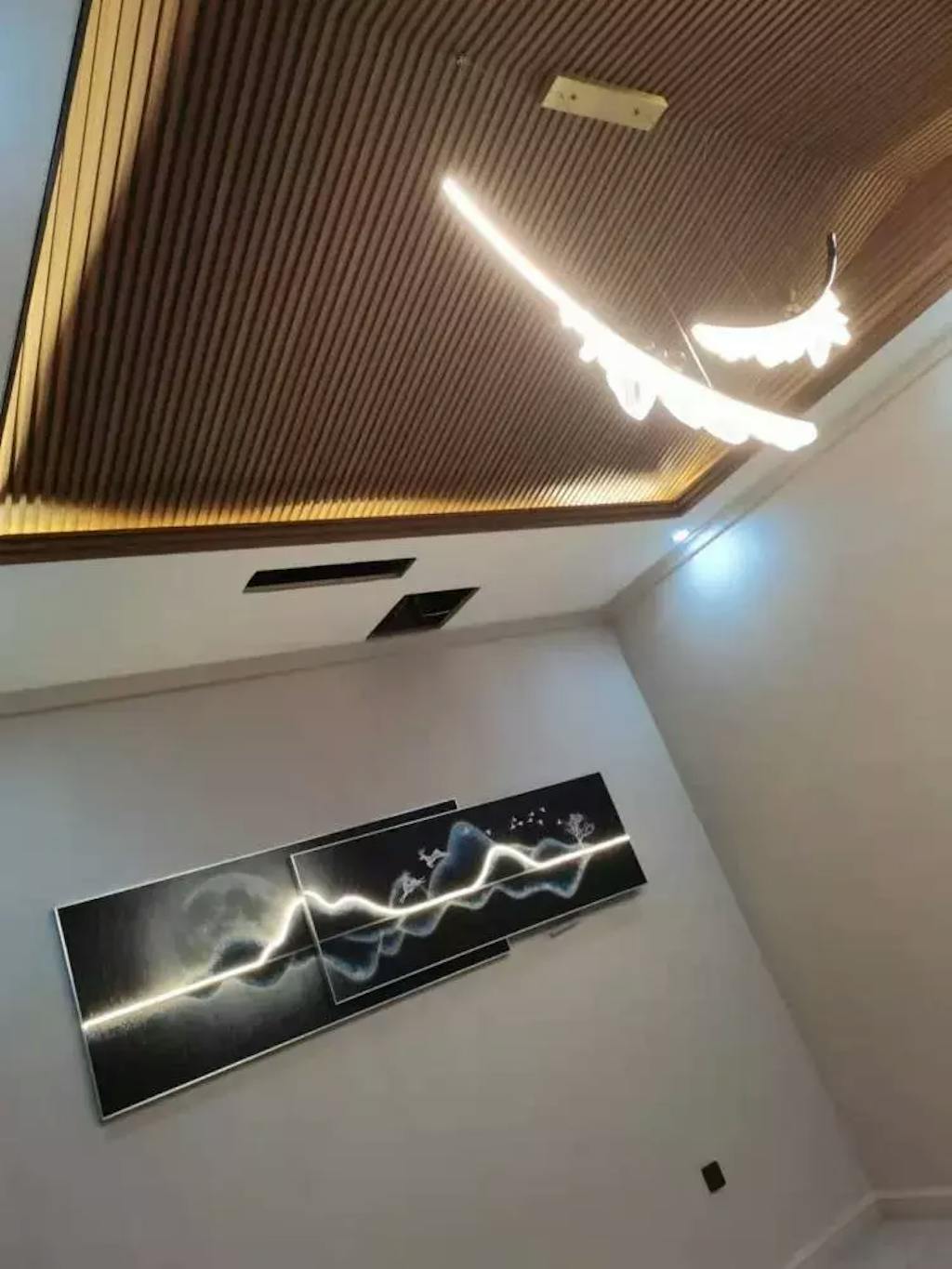 Golden Feathered Wing Suspension Lights for Enchanted Interiors