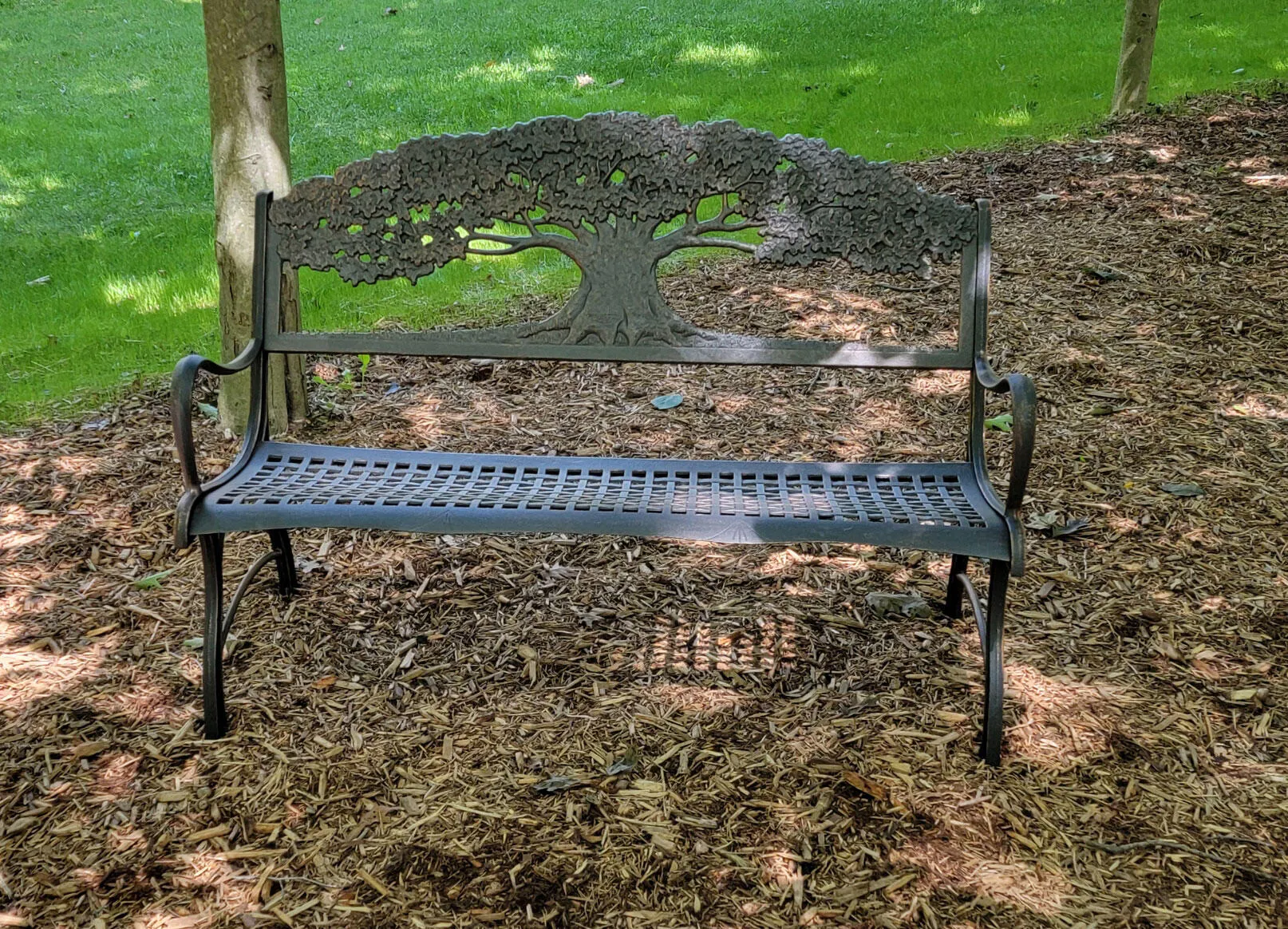 Cast Iron Tree Bench designed by Painted Sky Designs