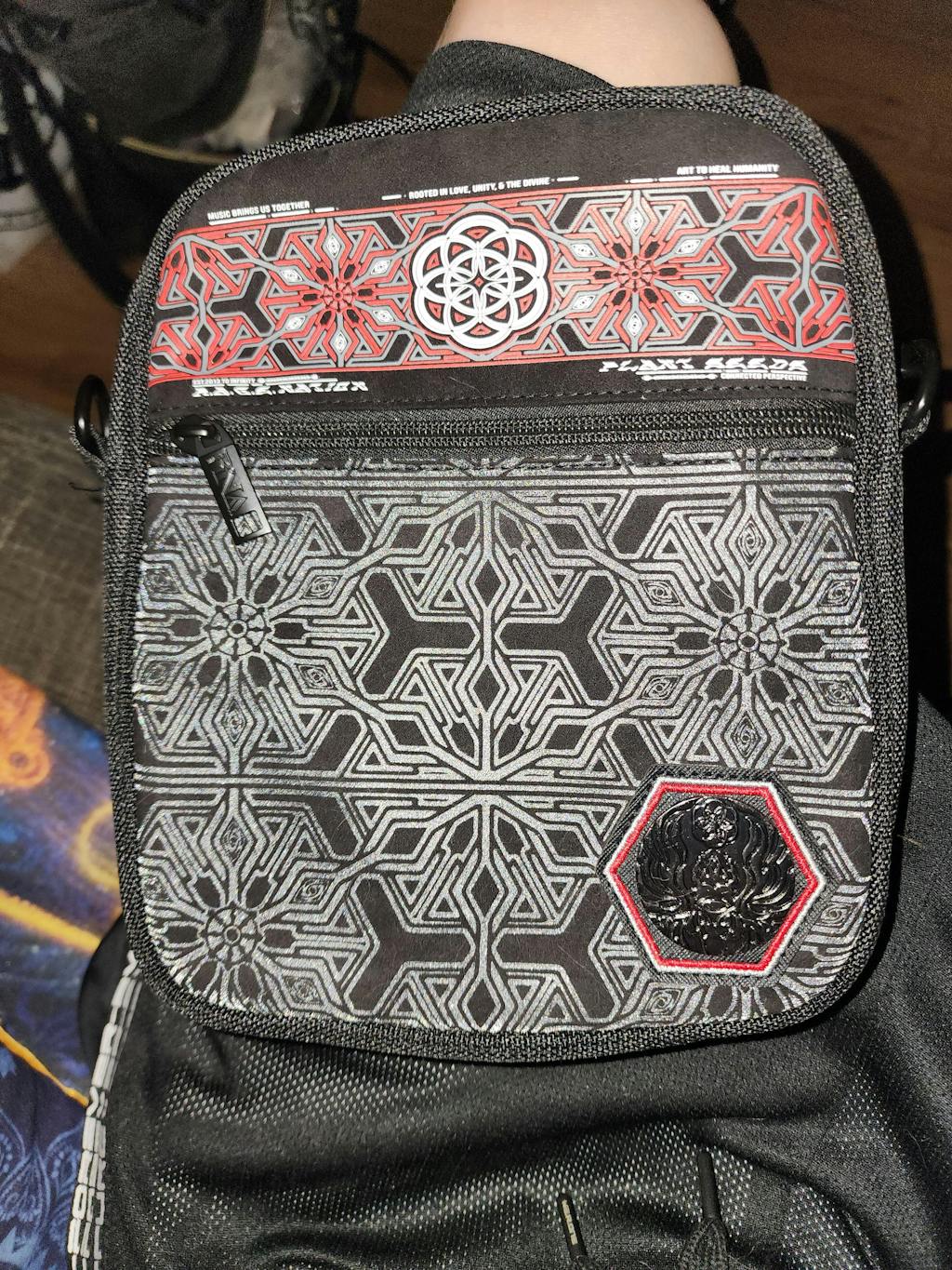 PROTECTED BY INTENT SHOULDER BAG