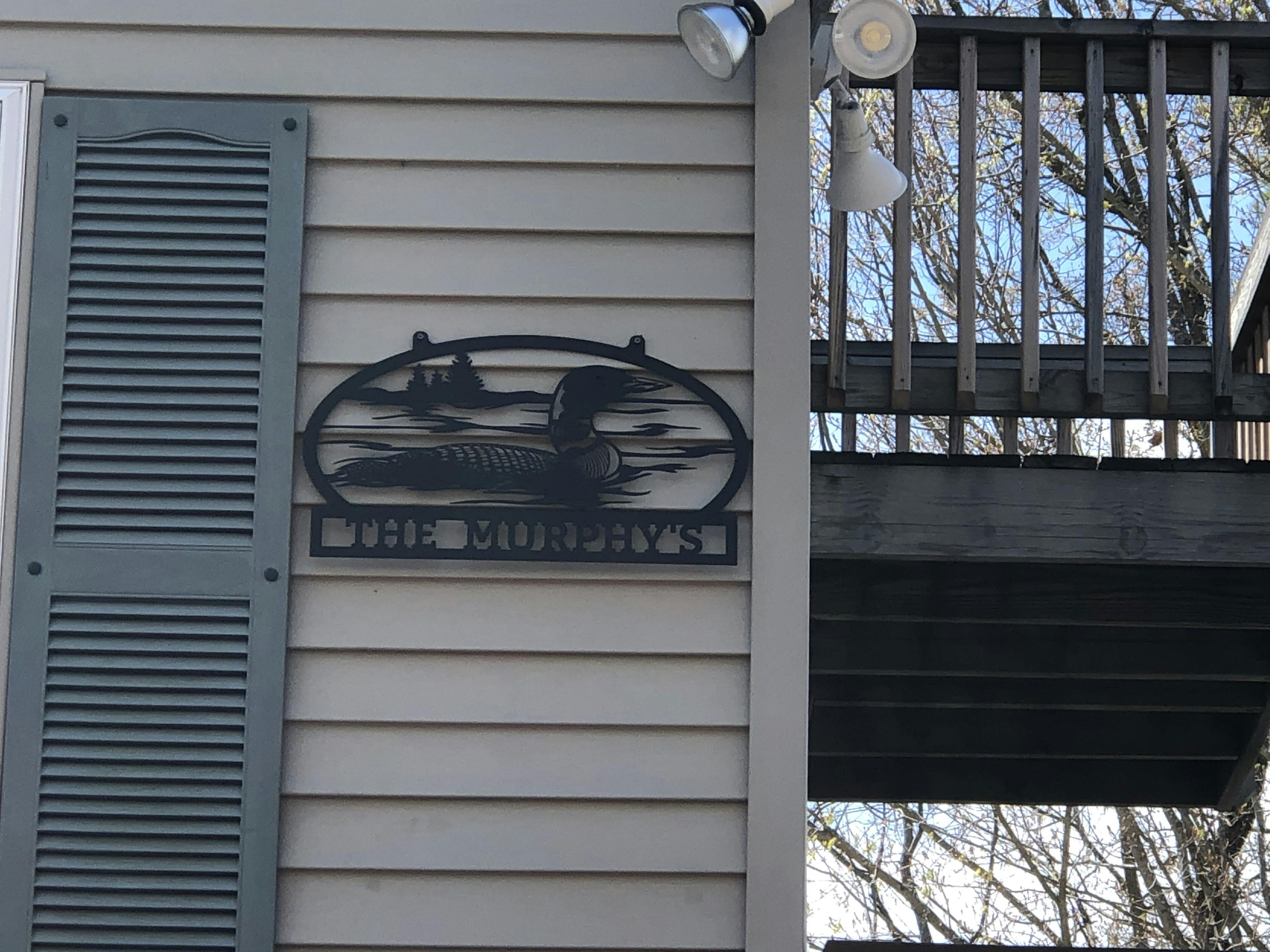 Outdoor Sign with Loon - RealSteel Center