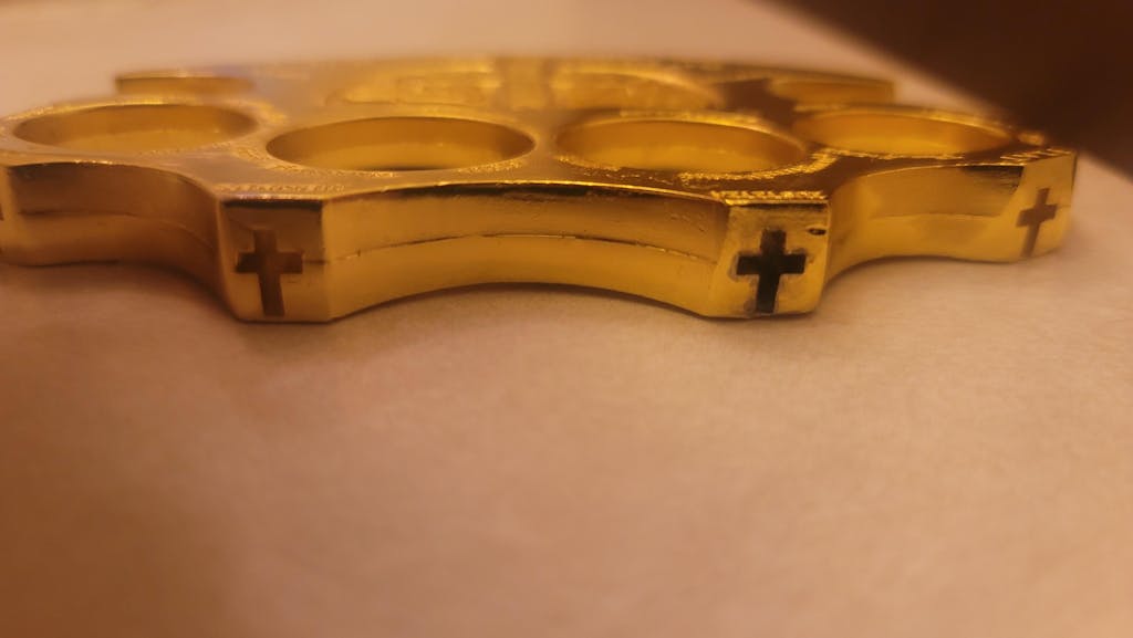 Constantine Brass Knuckles Holy Spiritus Paperweight - Gold – Slash2Gash