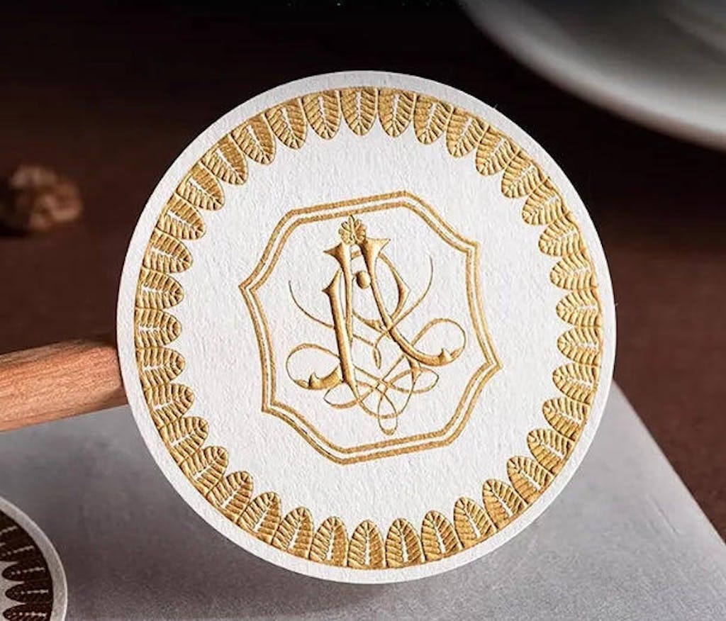 Premium Embossed Gold Foil Labels & Textured Stickers | Stamprints