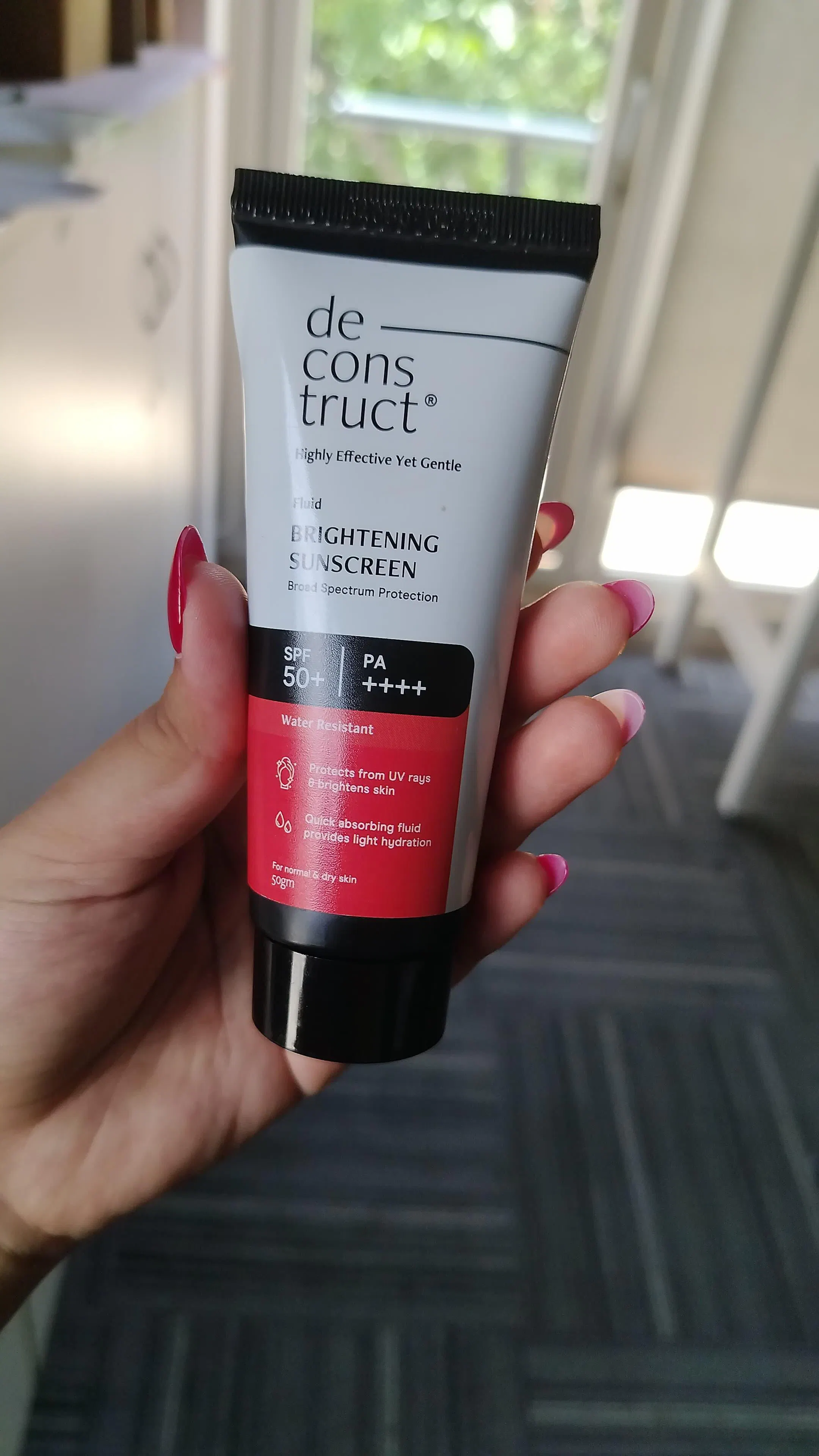 Fluid Brightening Sunscreen with spf 50+ - Prevents Tanning & Provides ...