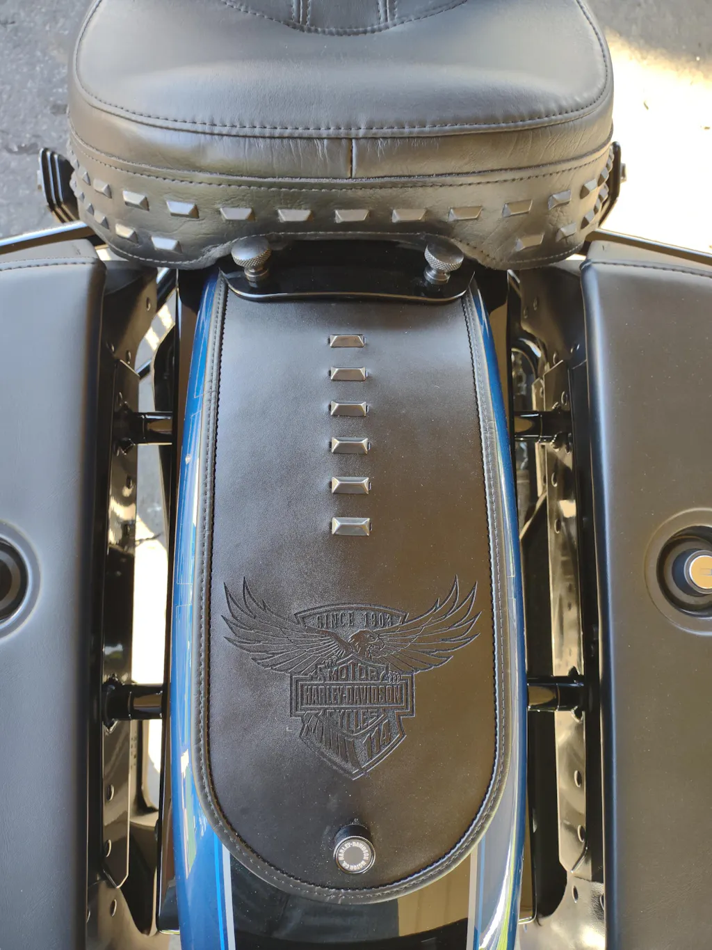 Three Mutts Custom Leather tank bibs, fender bibs, bags and more!