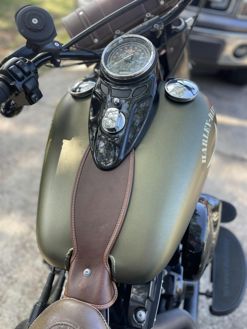 Three Mutts Custom Leather tank bibs, fender bibs, bags and more!