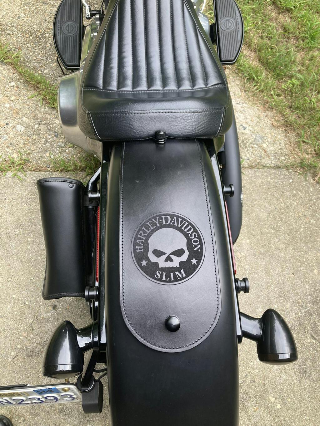 Three Mutts Custom Leather tank bibs, fender bibs, bags and more!