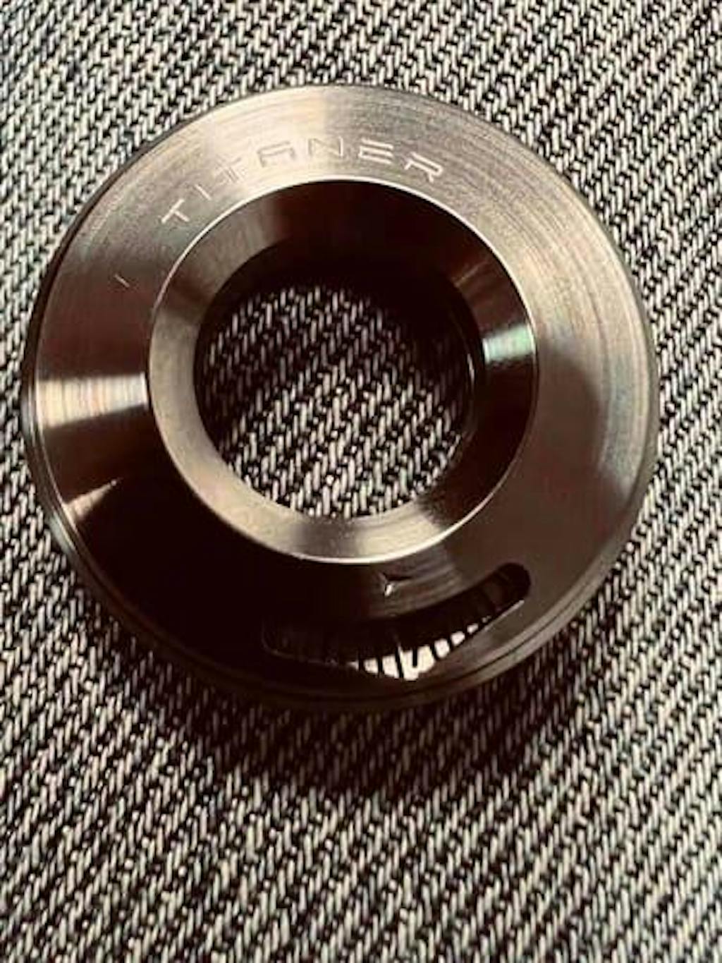 Tiroler: Exquisite Titanium Curve Measure Ring on Fingertips – Titaner