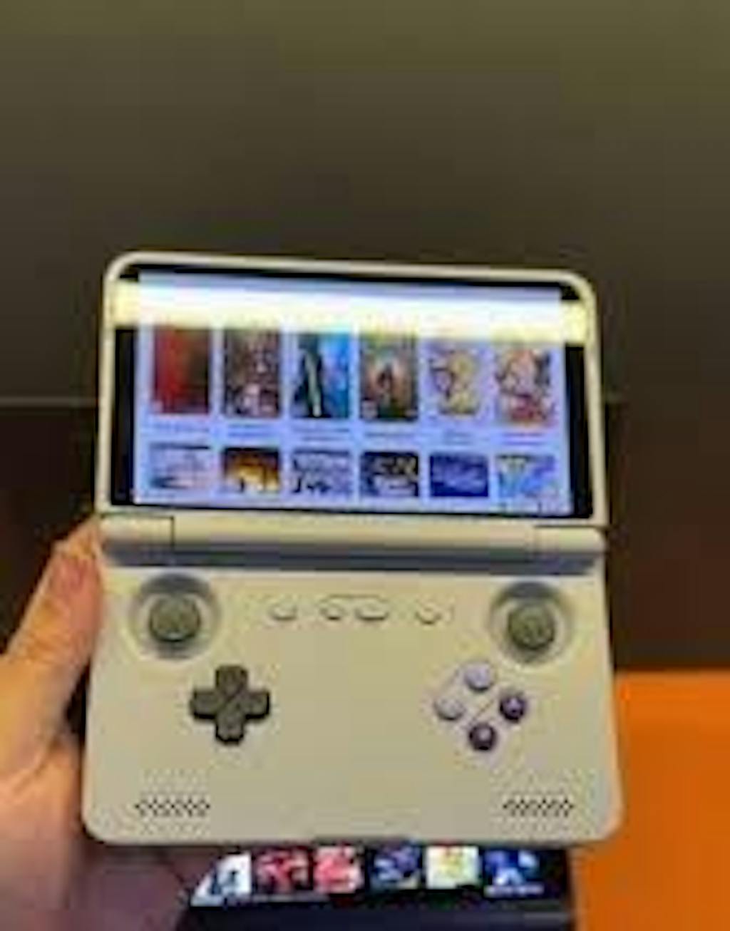 Retroid Pocket Flip 2 Game Console Android 5.5" AMOLED Screen - WhatGeek